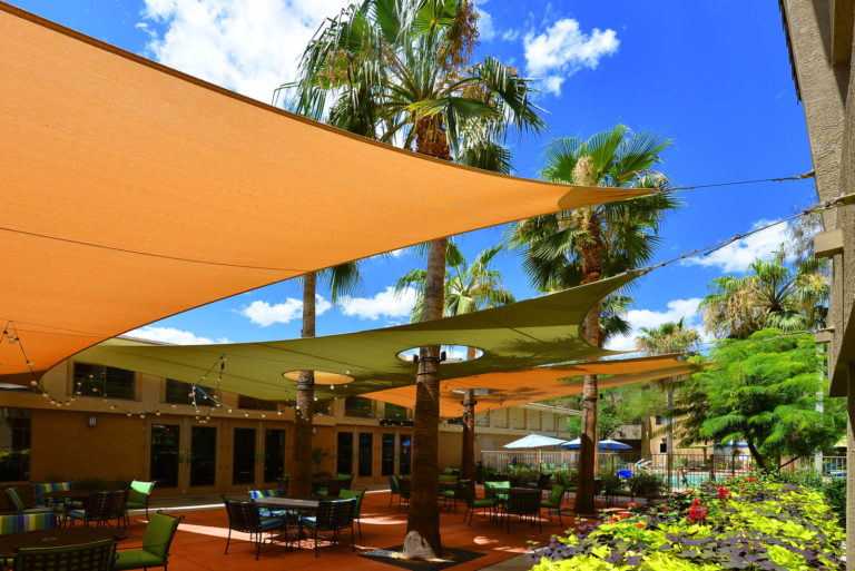 Customized courtyard shade sails - Fabric Architecture Magazine